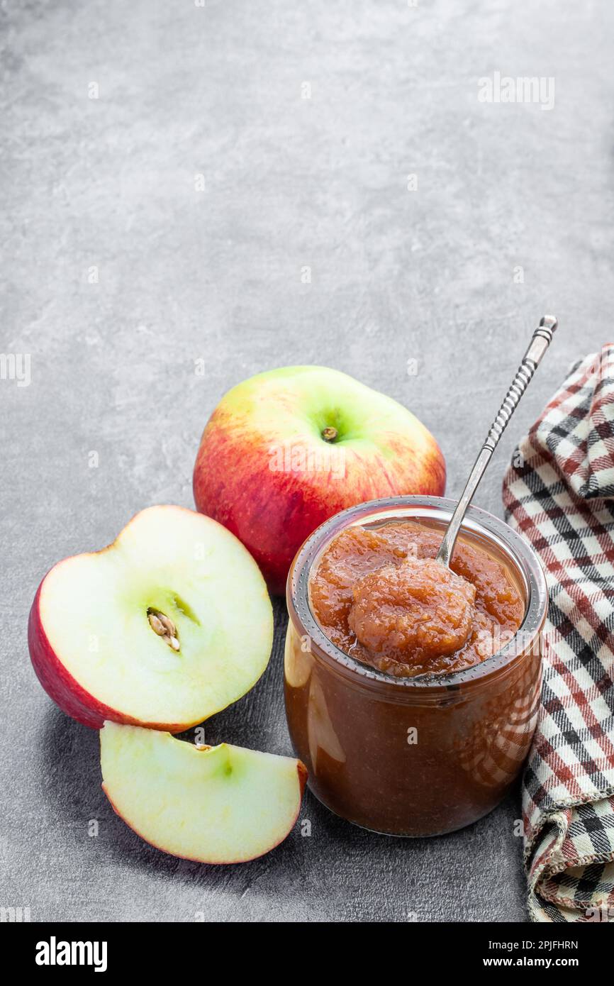 Homemade fresh apple puree on gray background Stock Photo - Alamy