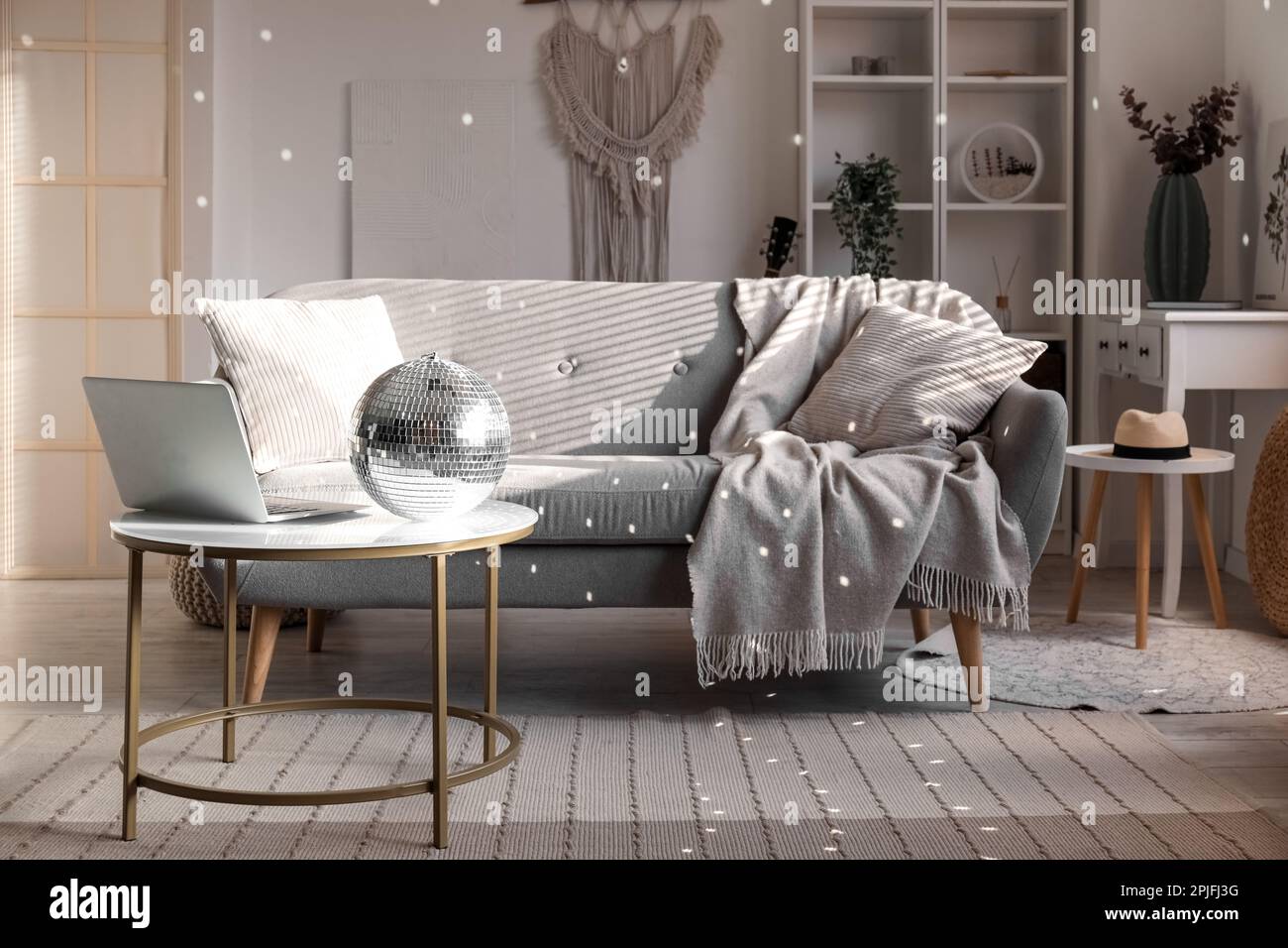 Interior of living room with disco ball and sofa Stock Photo - Alamy
