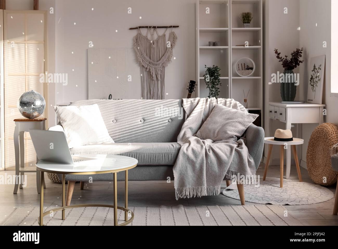 Interior of living room with disco ball and sofa Stock Photo - Alamy