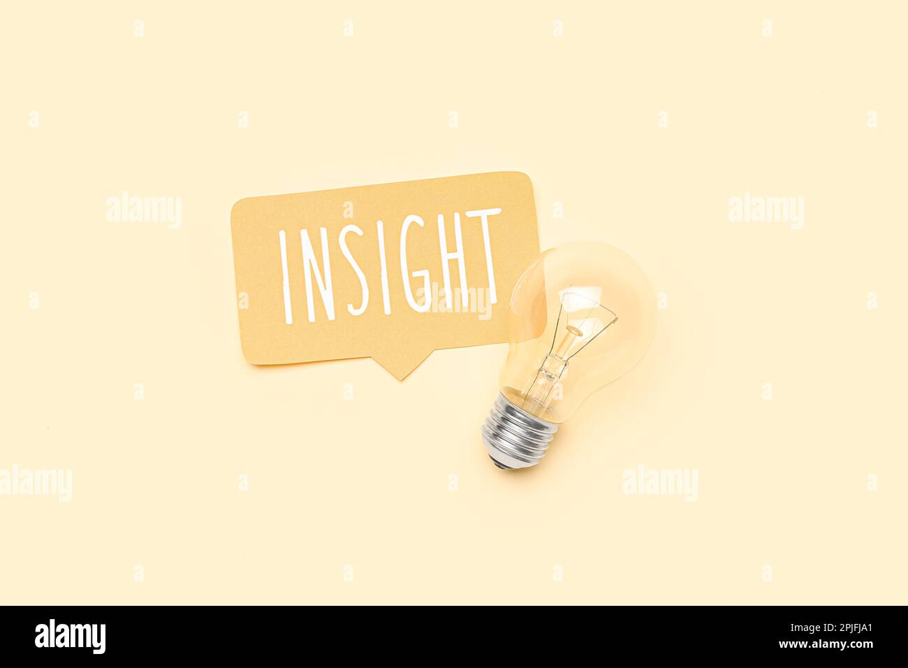Speech bubble with word INSIGHT and light bulb on beige background ...