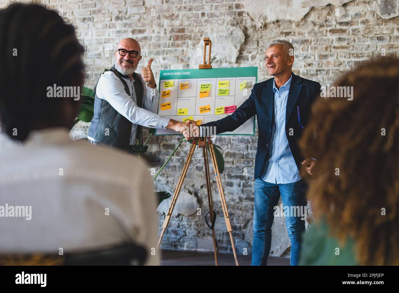 Business model canvas discussion hi-res stock photography and images ...