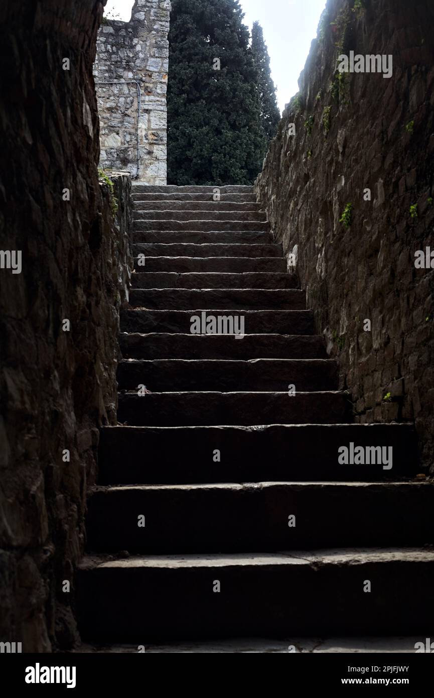 Staircase under a covered passage in a castle Stock Photo - Alamy
