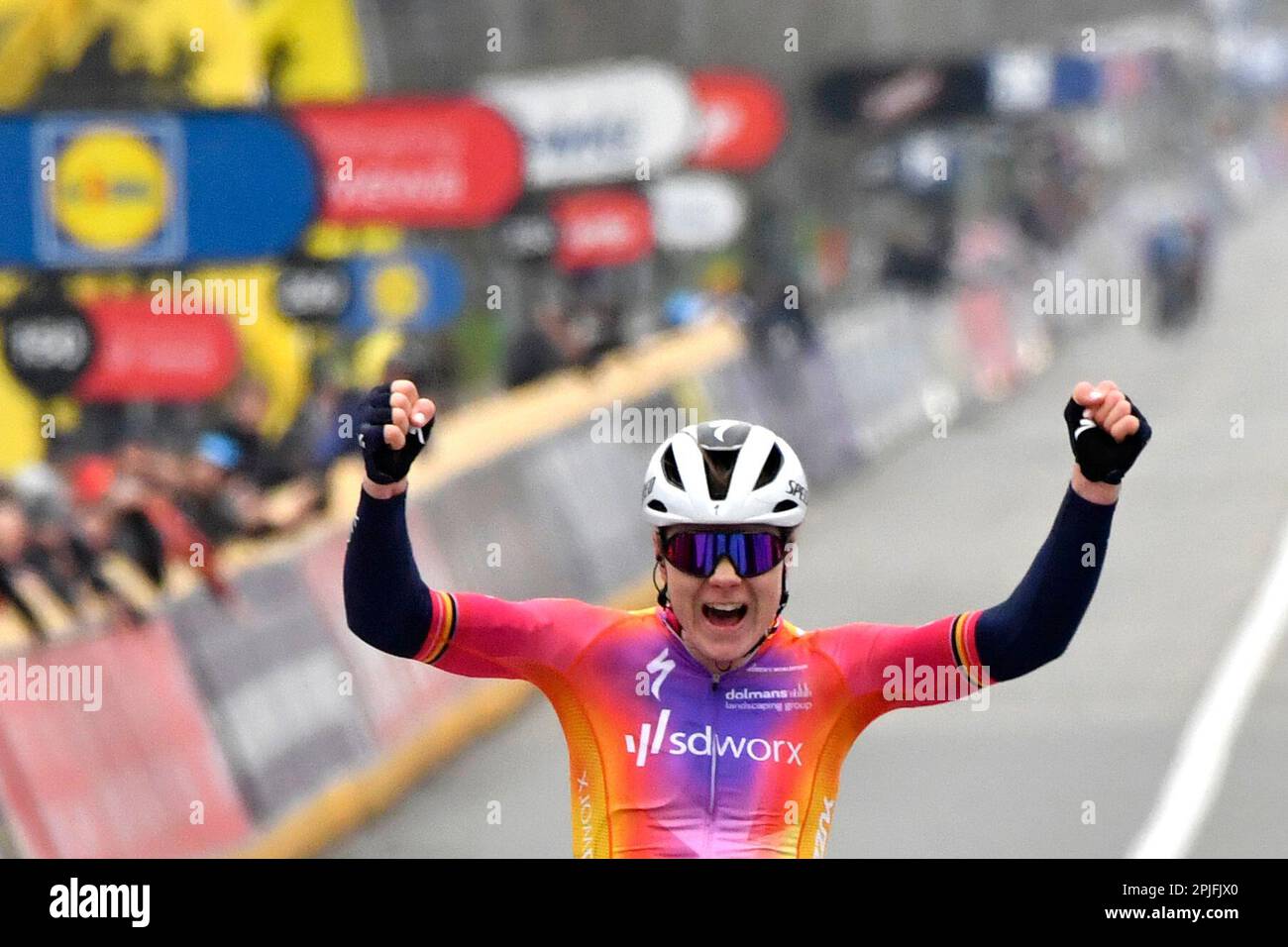 Belgium's Lotte Kopecky of the SD Worx team crosses the finish line to ...