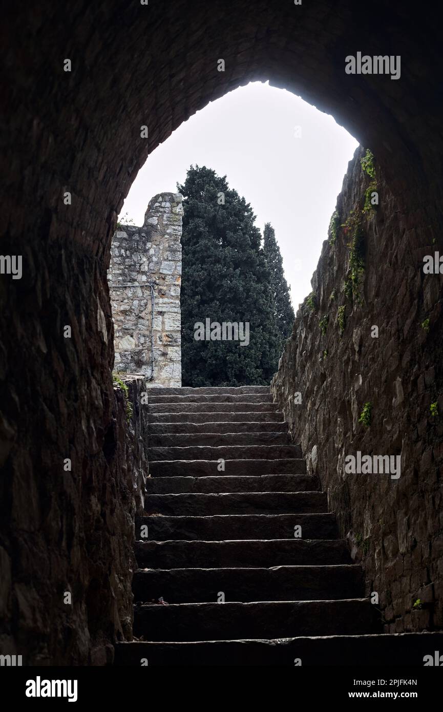 Staircase under a covered passage in a castle Stock Photo - Alamy