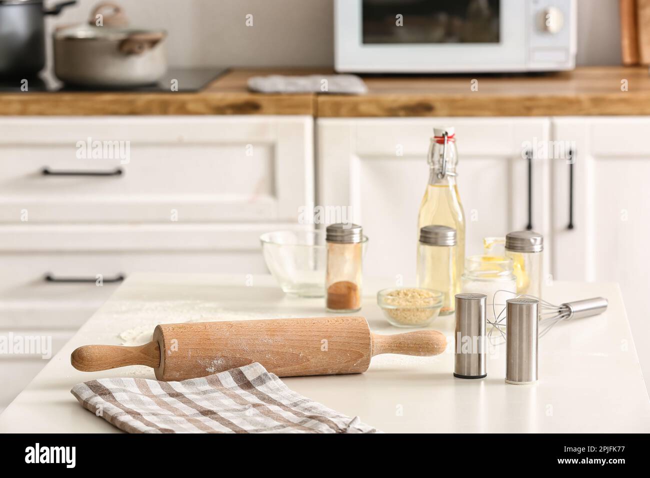 Rolling pin and ingredients for preparing Italian Grissini on table in ...