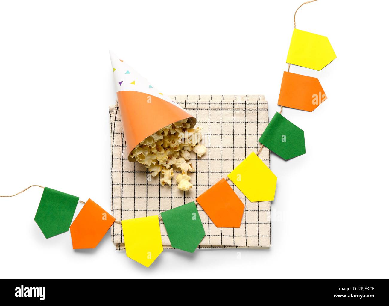 Party cone with popcorn, flags and napkin on white background. Festa ...