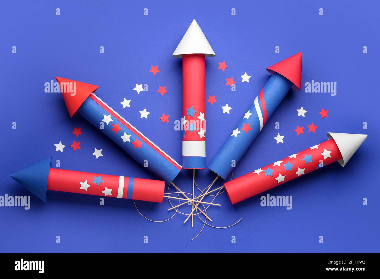 Firework rockets with stars for Independence Day on blue background ...