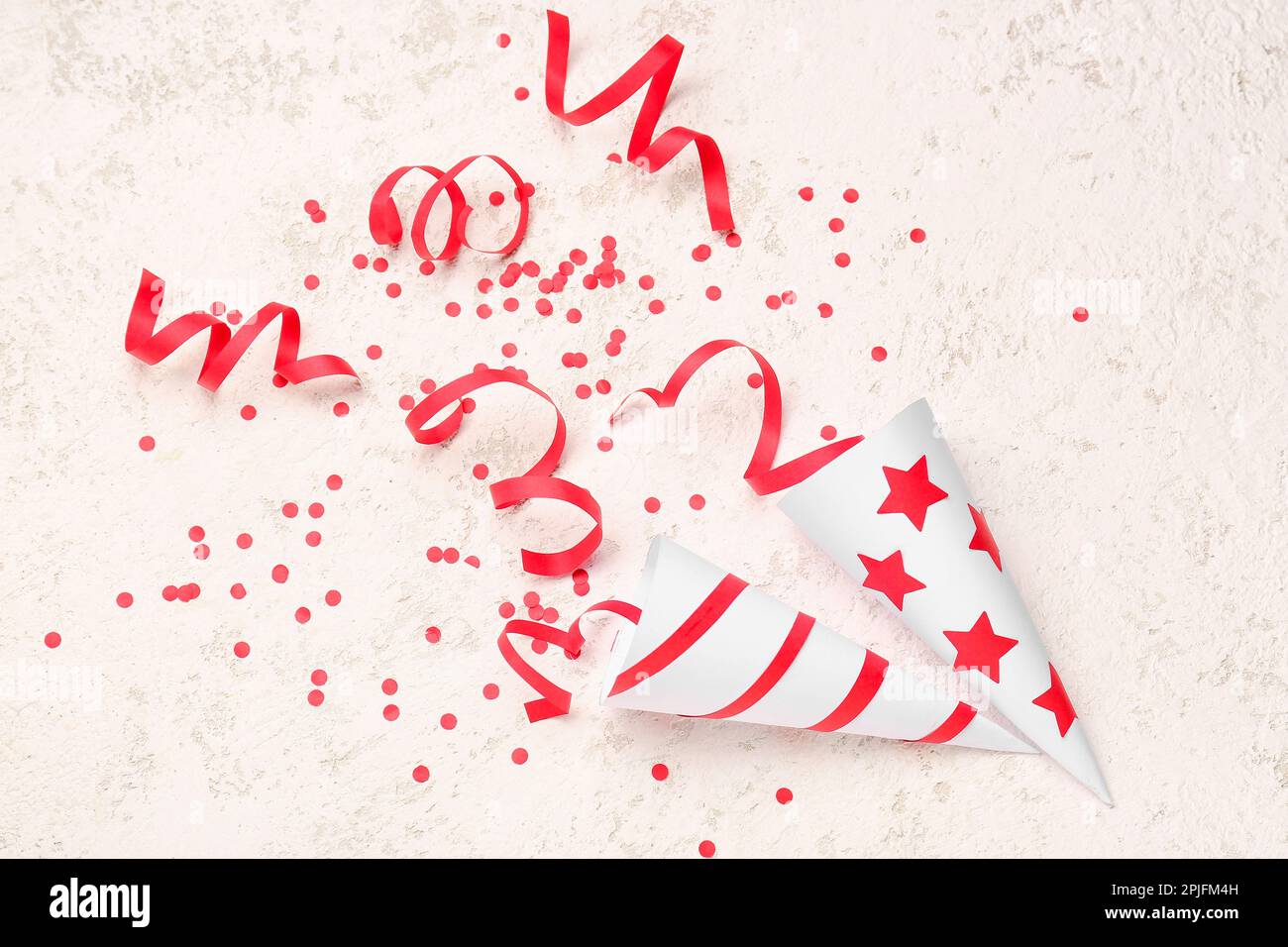 Party cones with serpentine and confetti on grunge background Stock ...