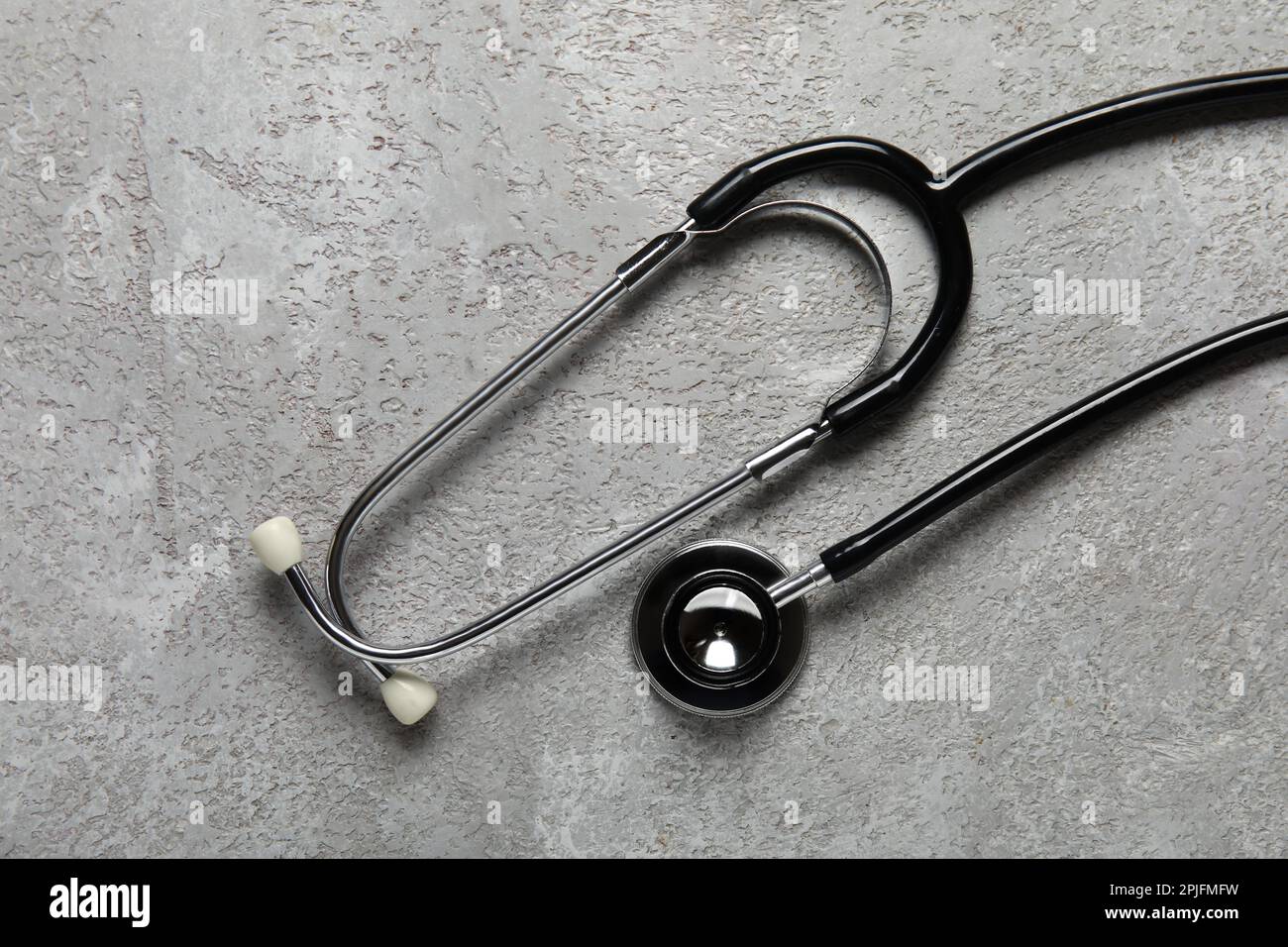 Modern stethoscope on grey background Stock Photo - Alamy