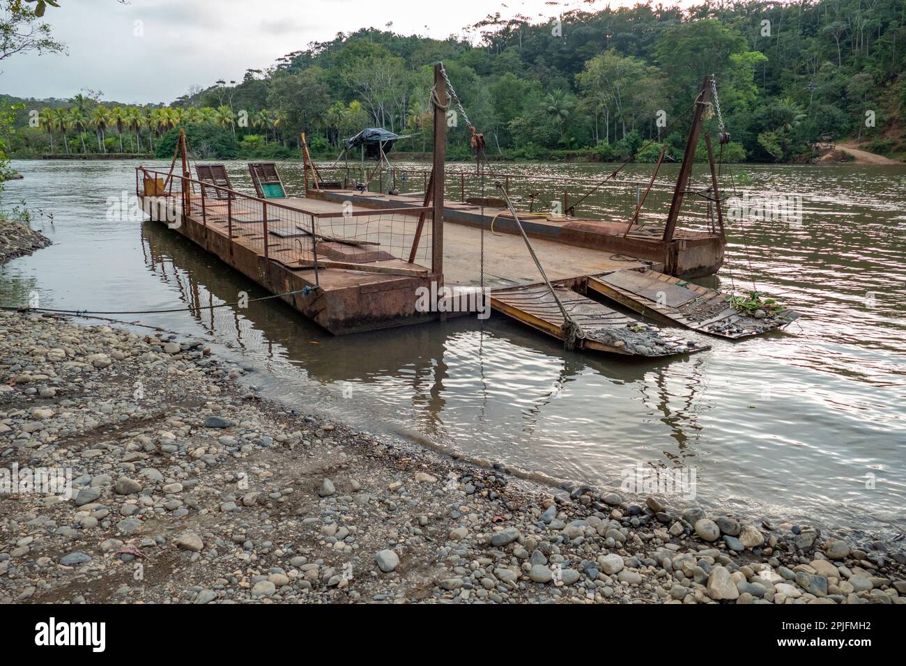 old rusty ferry operating at a river in the jungle in Costa Rica Stock ...