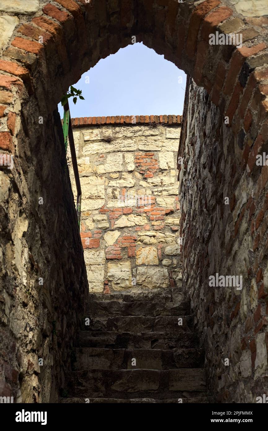 Staircase under a covered passage in a castle Stock Photo - Alamy