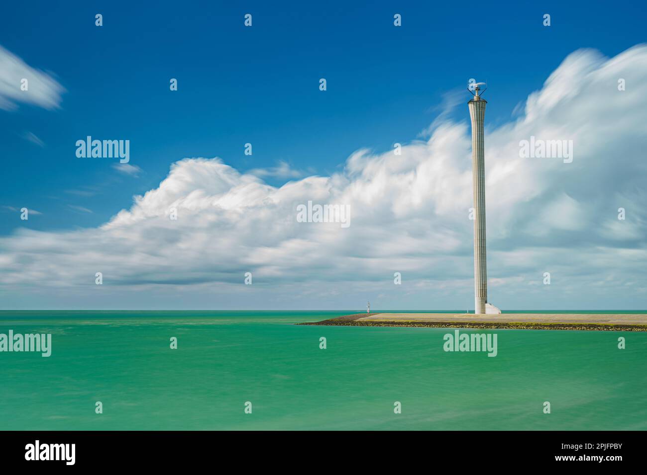 The 118 meter high radar tower is located on the breakwater of the work ...
