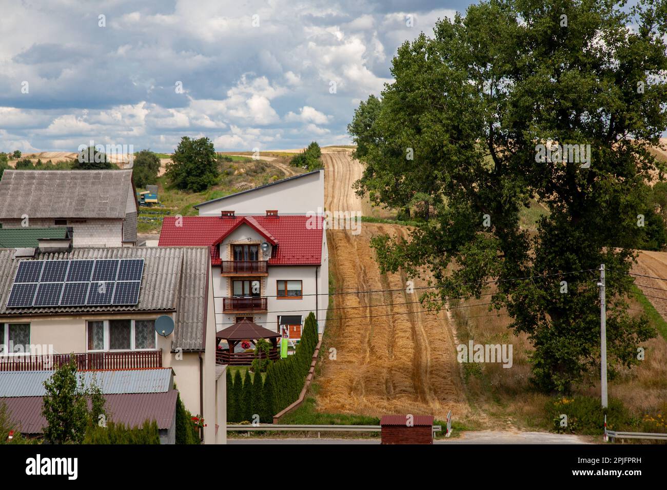 Countryside village harvesting season farm scenery Stock Photo - Alamy