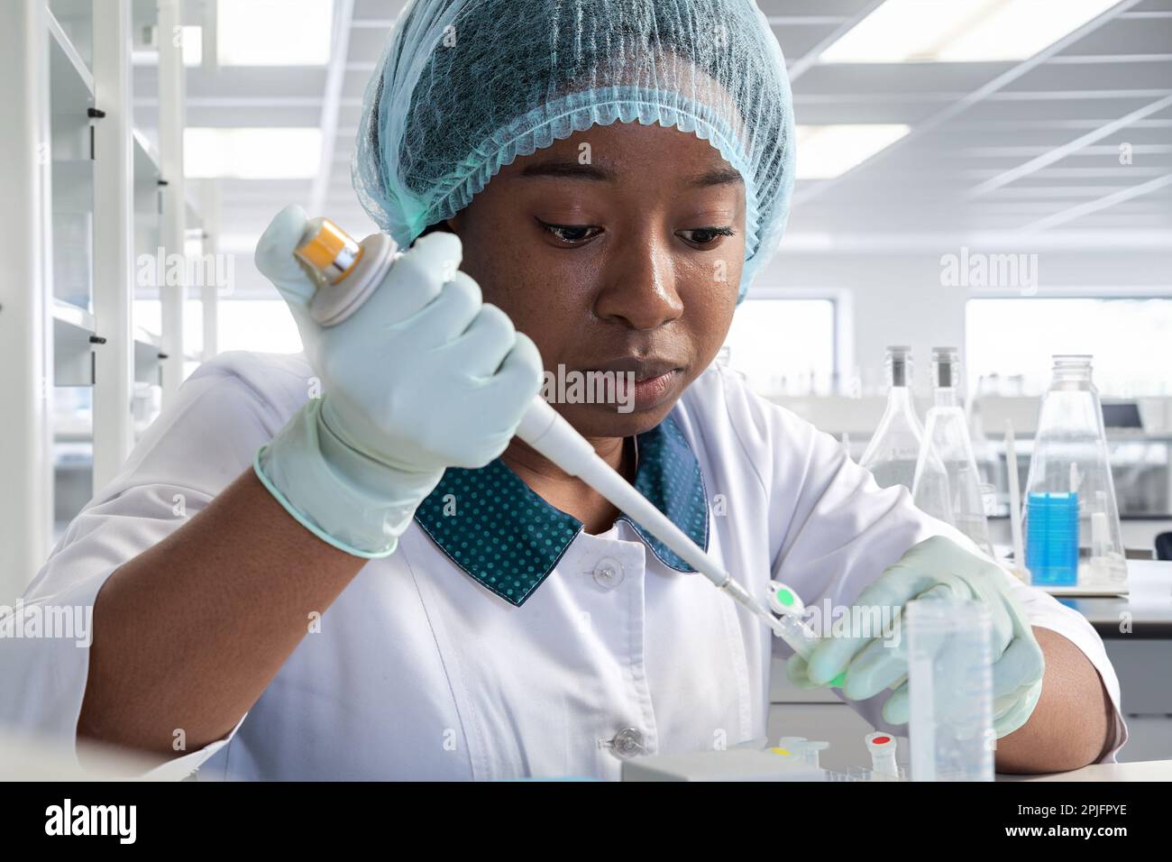 African female scientist working laboratory, research facility. Medical ...