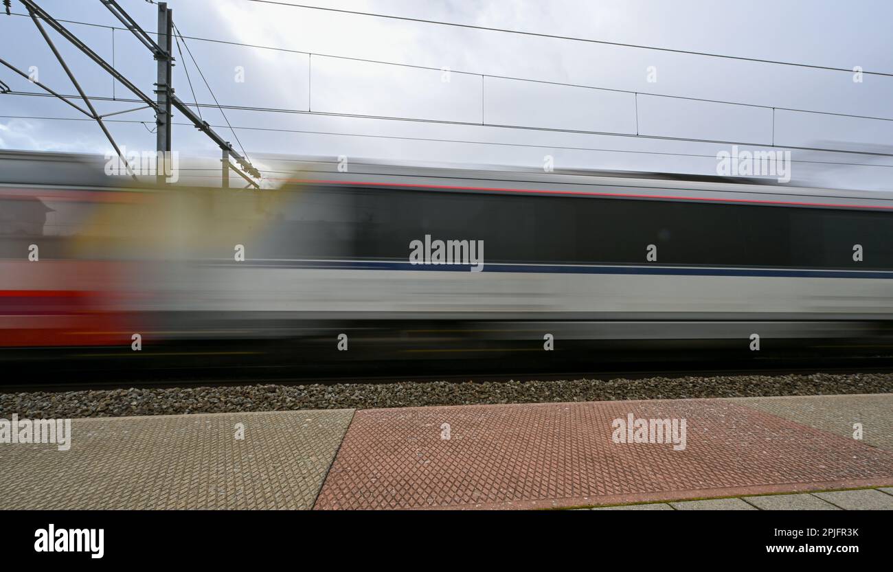 illustration picture of a NMBS - SNCB Train passing by in Zaventem ...