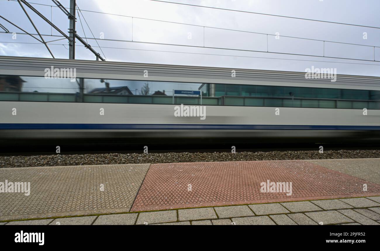 illustration picture of a NMBS - SNCB Train passing by in Zaventem ...