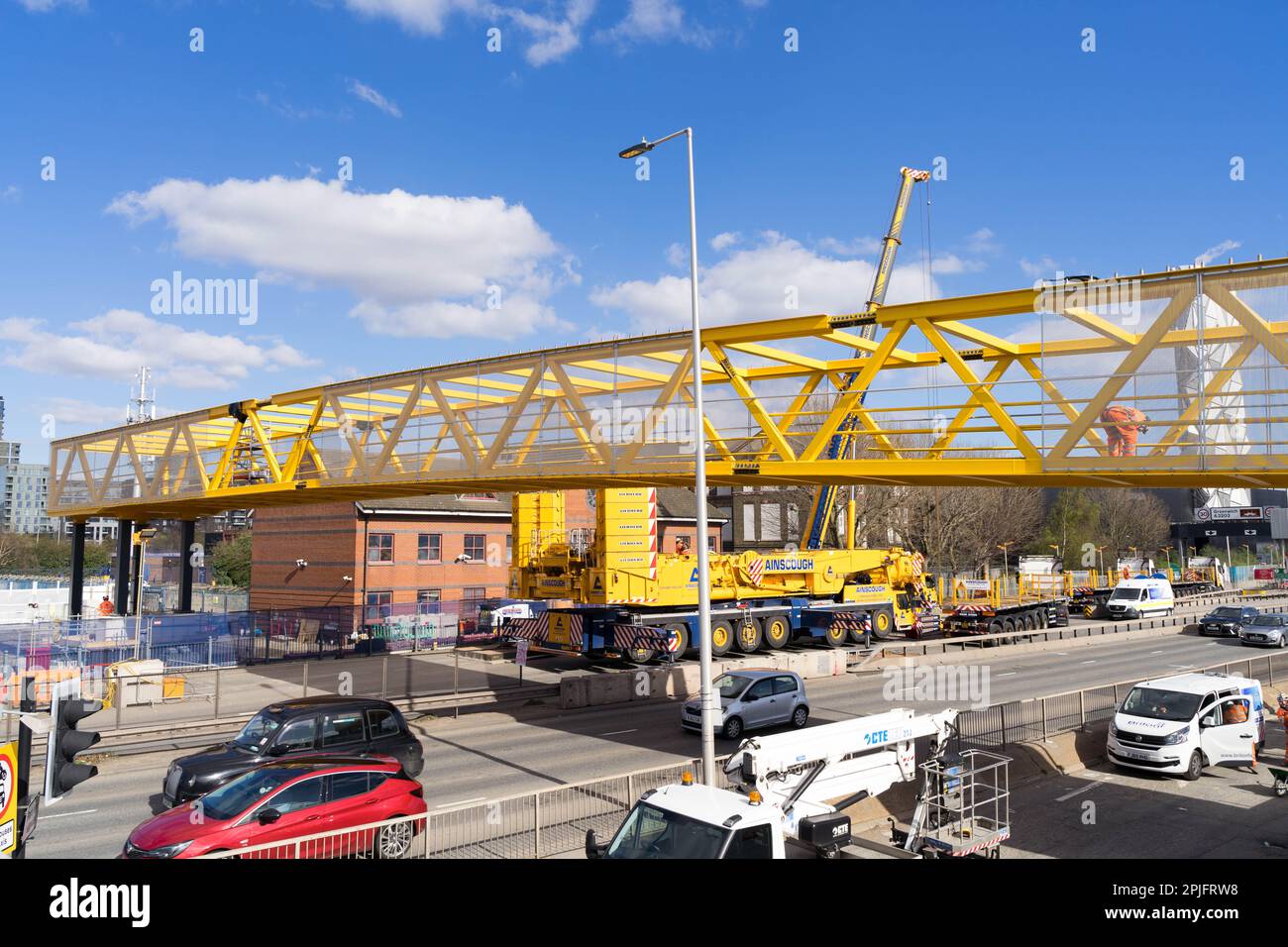 London UK, 2nd April 2023.A new cycling and walking footbridge is being ...