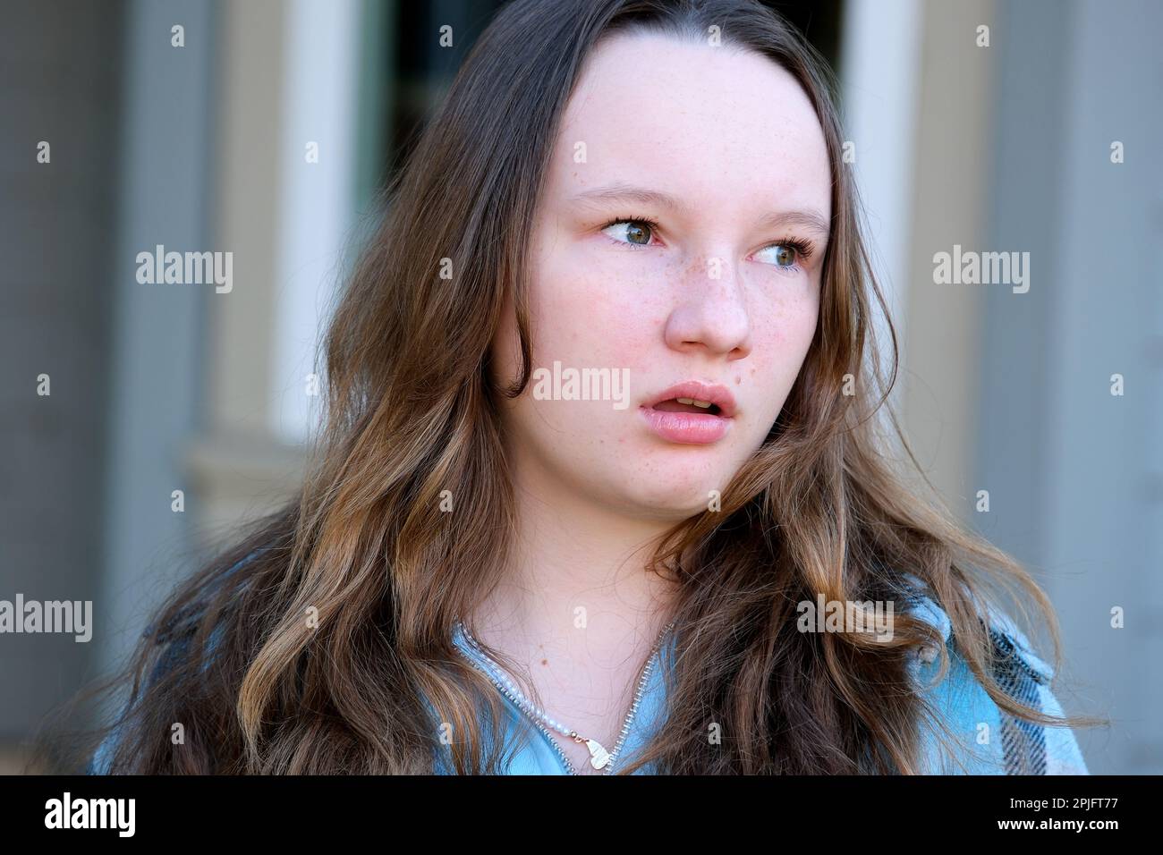close-up face of a teenage girl disappointment slightly open mouth ...