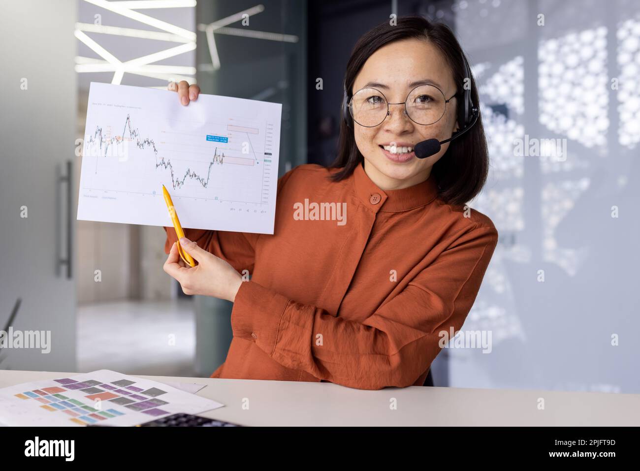 Online meeting video meeting discussion, Asian woman looking at camera ...