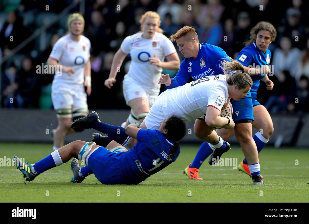England’s Sarah Beckett is tackled by Italy’s Sara Tounesi during the ...