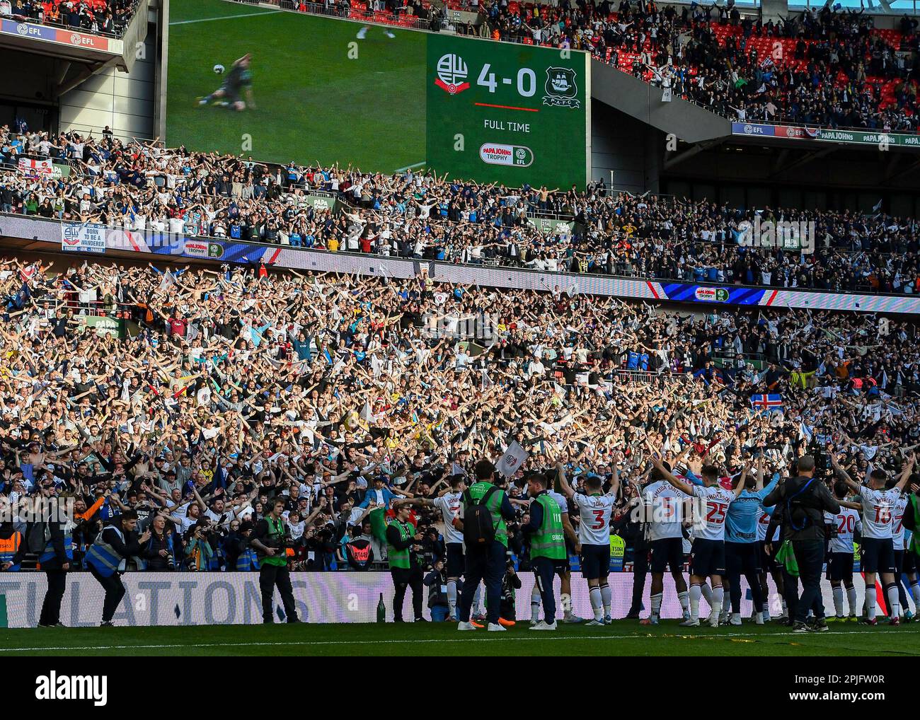 Bolton Wanderers players celebrates a win at full time wit their fans ...