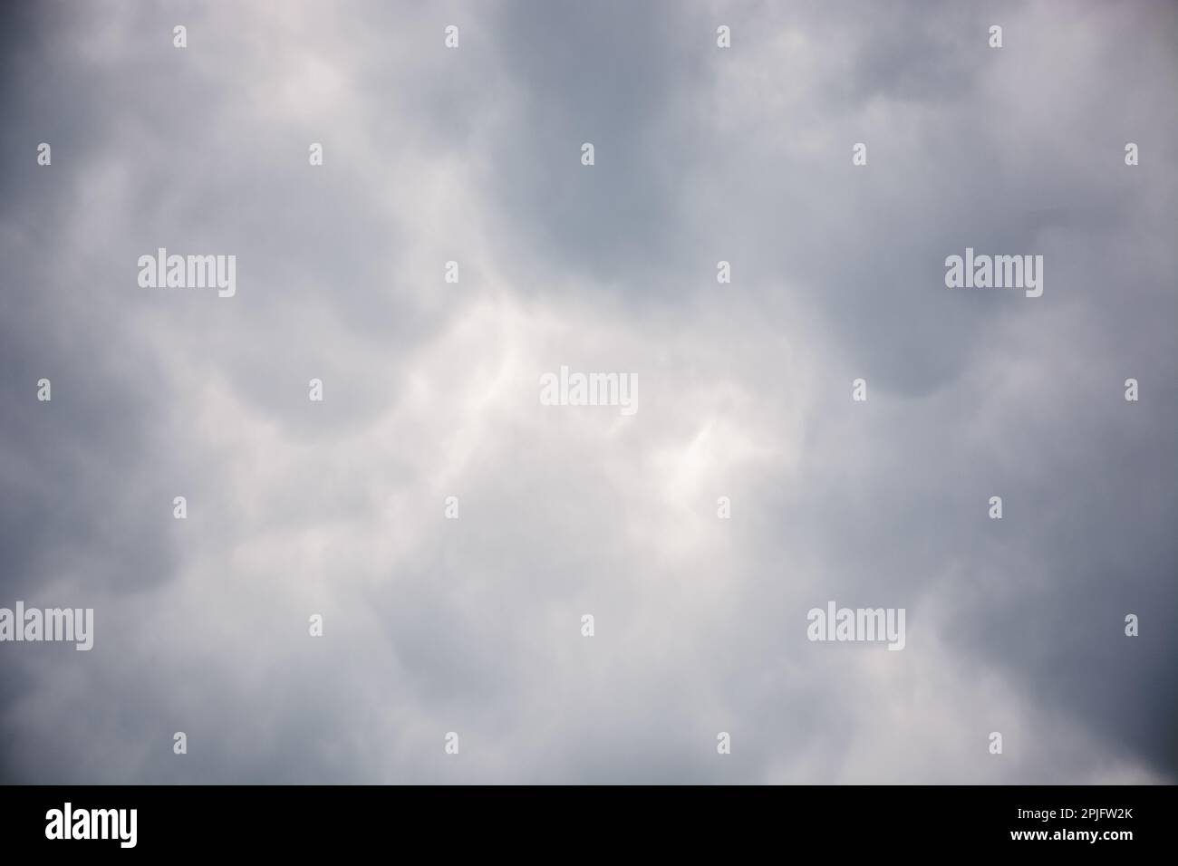 gray overcast sky with clouds. rainy weather forecast Stock Photo - Alamy