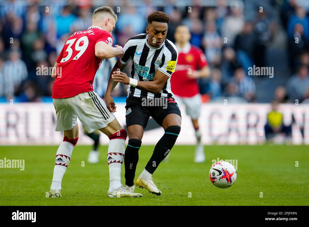 Manchester United's Scott McTominay, left, duels for the ball with ...
