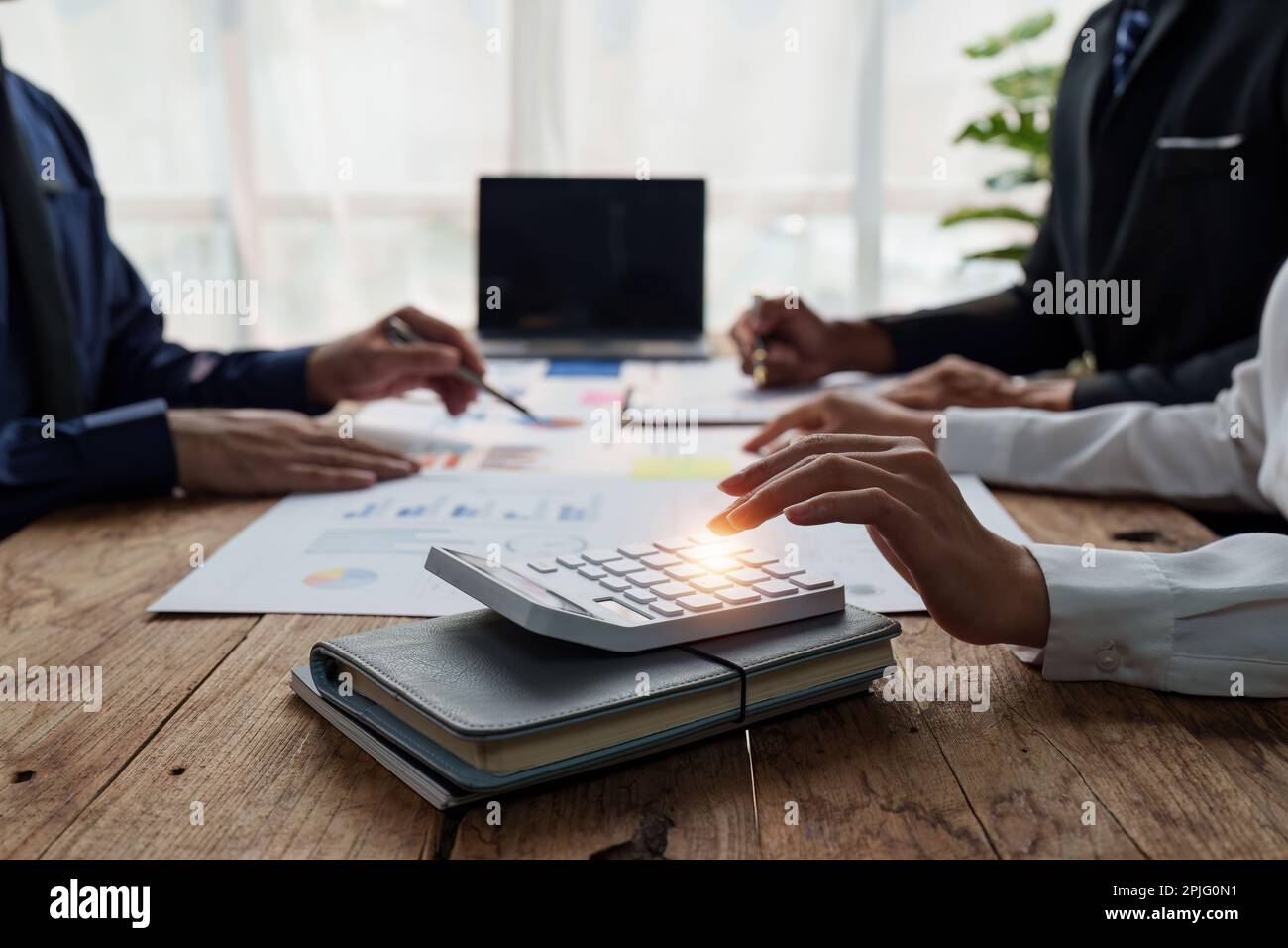 Group of Business People Meeting analysis financial plan, discussion ...