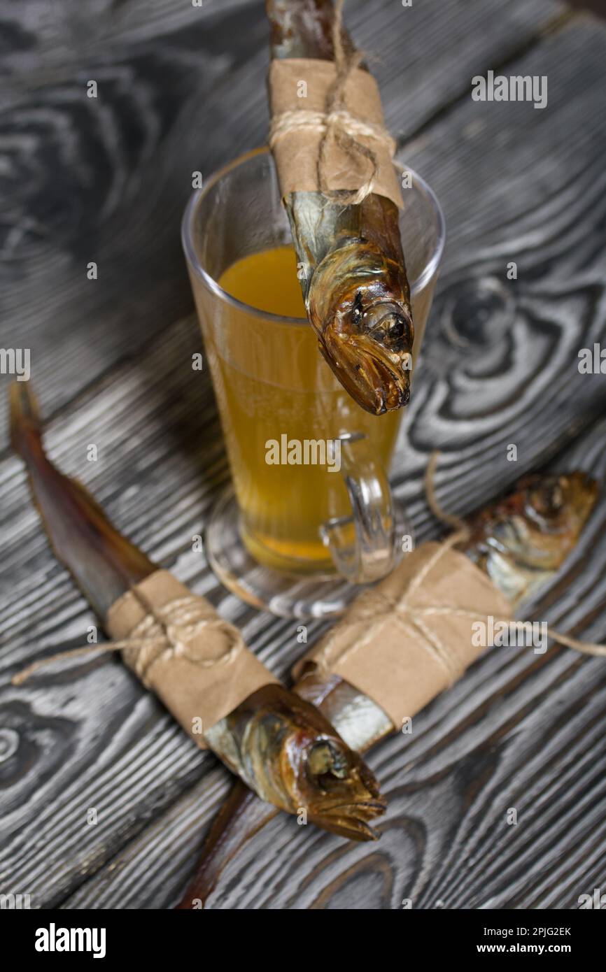 Putassu Cold smoked. The fish is wrapped with a strip of paper. Tied ...