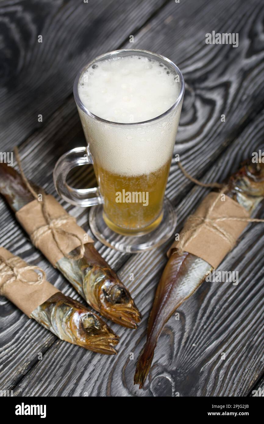 Putassu Cold smoked. The fish is wrapped with a strip of paper. Tied ...
