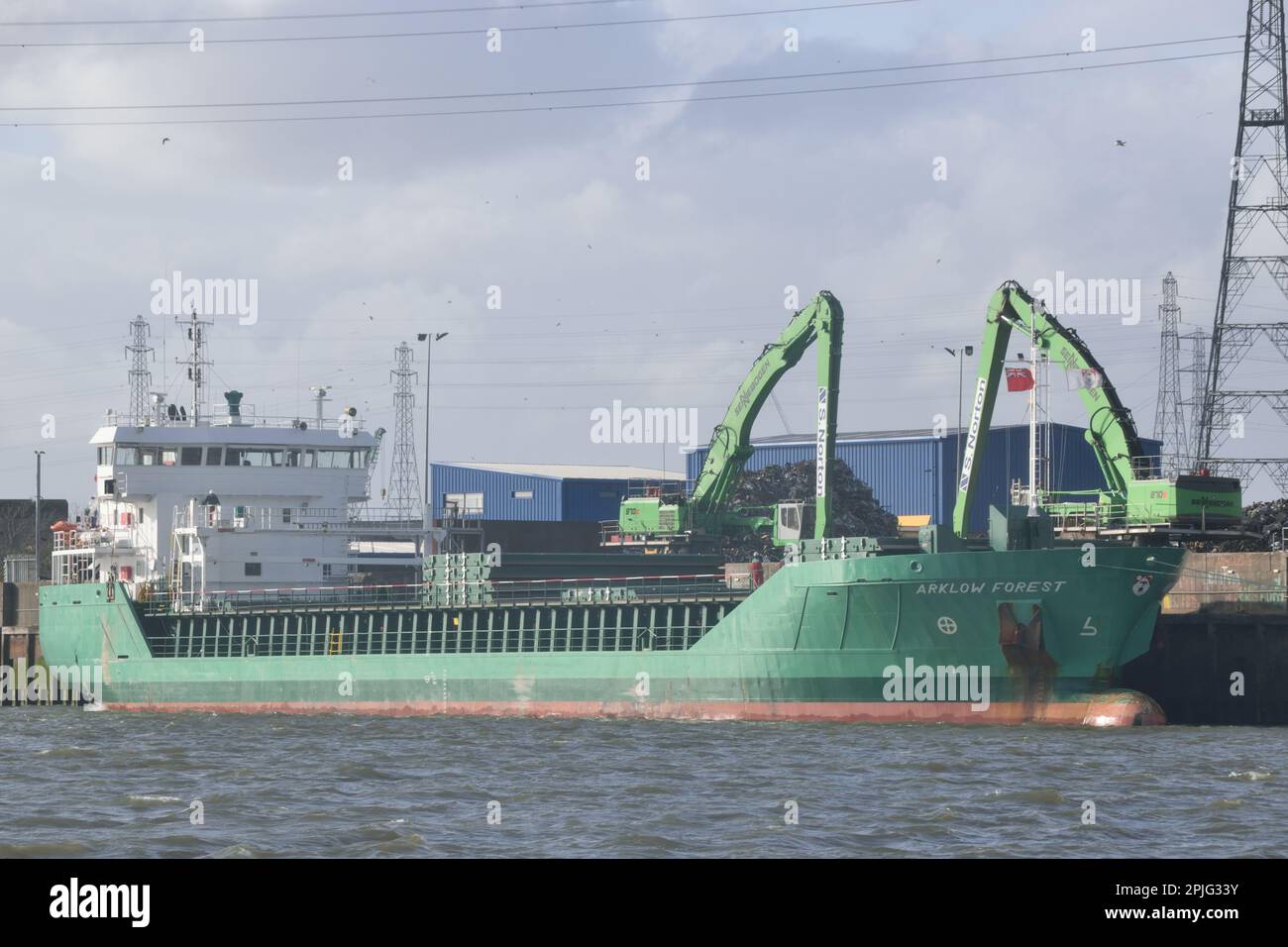 General Cargo Ship ARKLOW FOREST seen loading cargo at Docklands Wharf ...