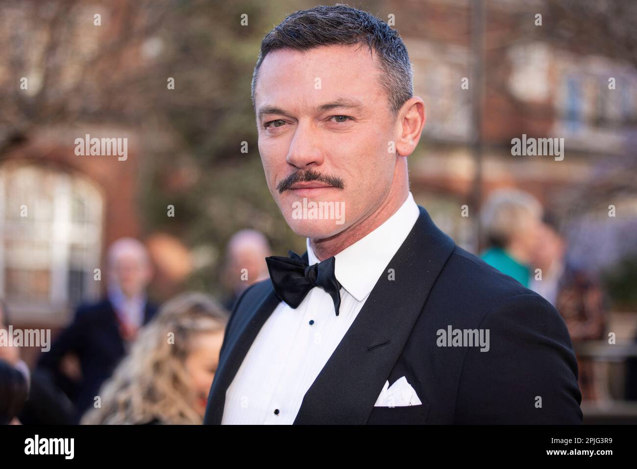 Luke Evans poses for photographers upon arrival at the Olivier Awards ...