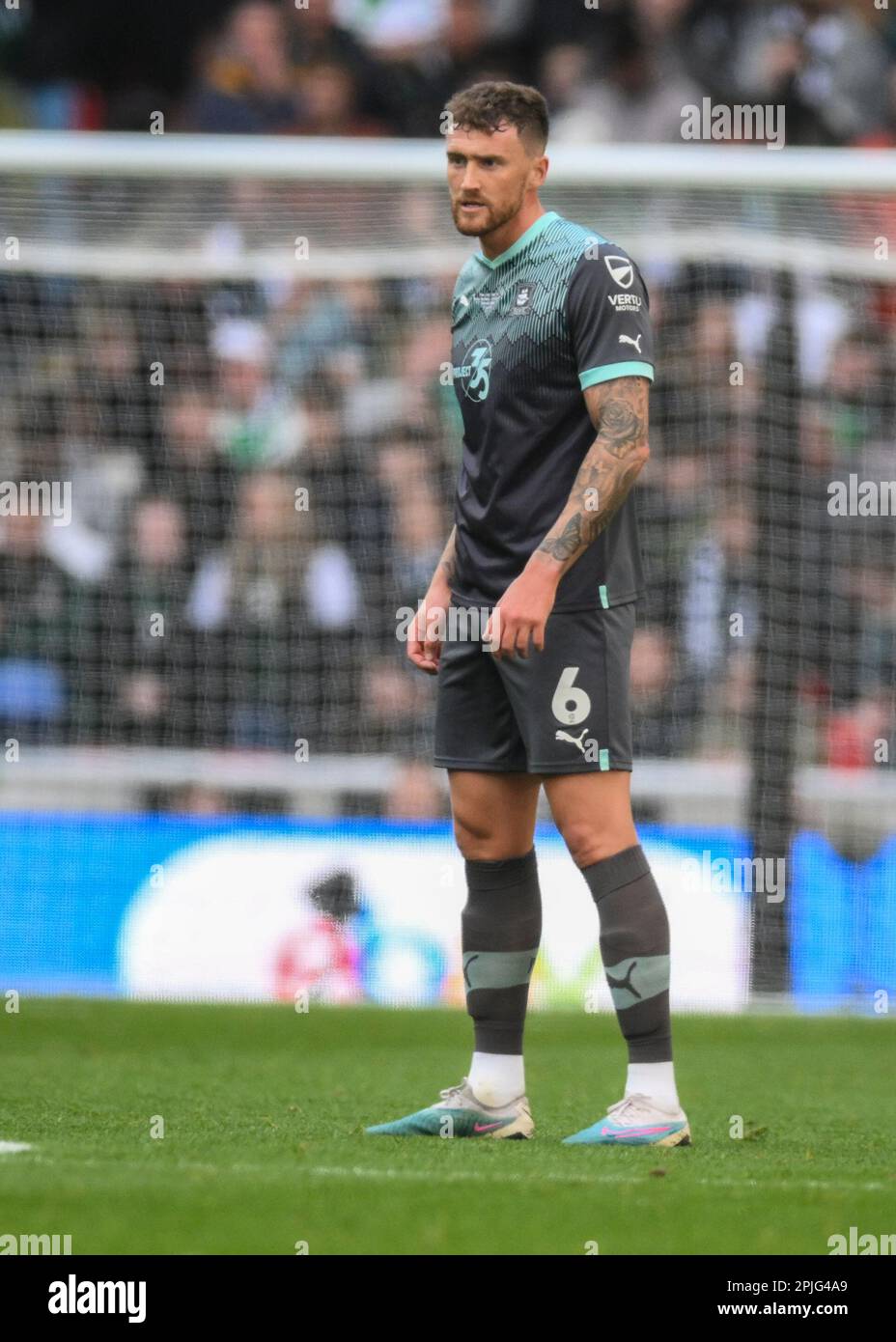 Dan Scarr #6 of Plymouth Argyle in action during the Papa John's Trophy ...