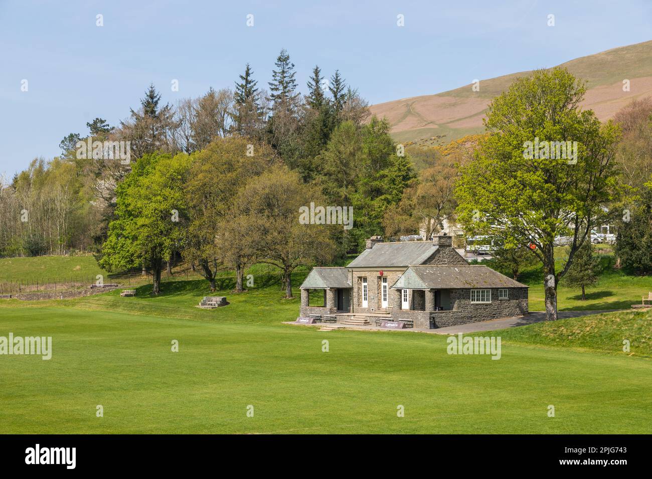 View of the buildings of the Sedbergh village. Beautiful garden. Sunny ...