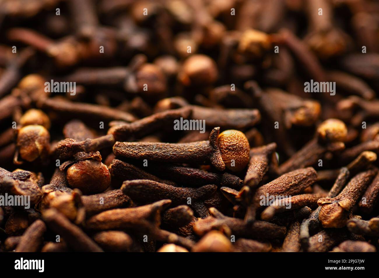 freshly dryed clove spice texture close up with selective focus Stock ...