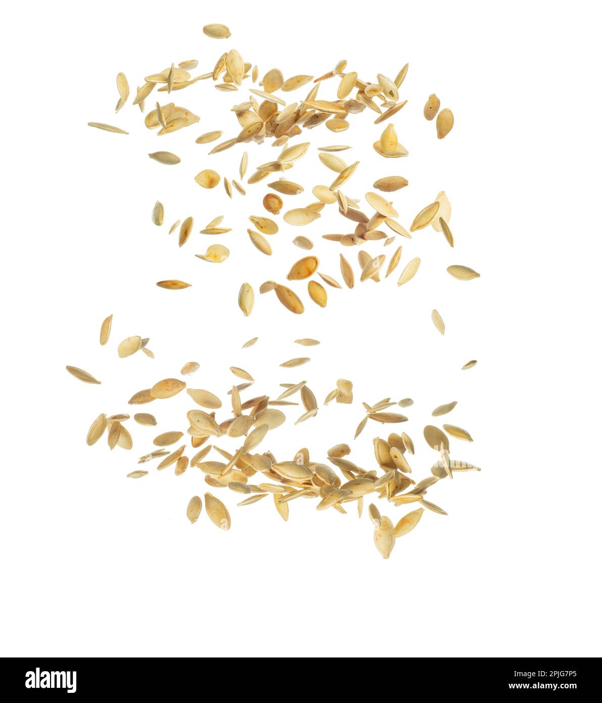 Falling Pumpkin seeds, isolated on white background, selective focus ...