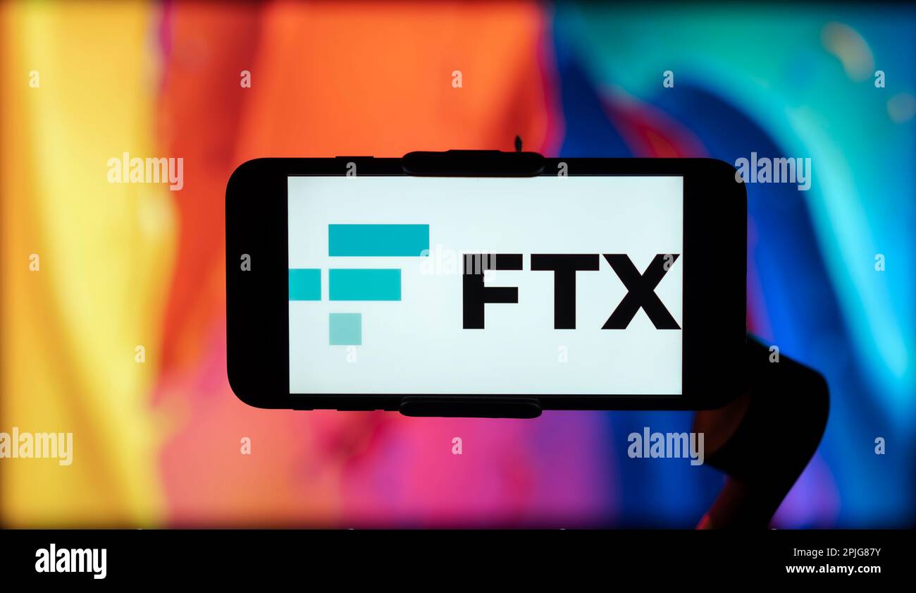 In this photo illustration, the FTX logo is seen displayed on a mobile ...