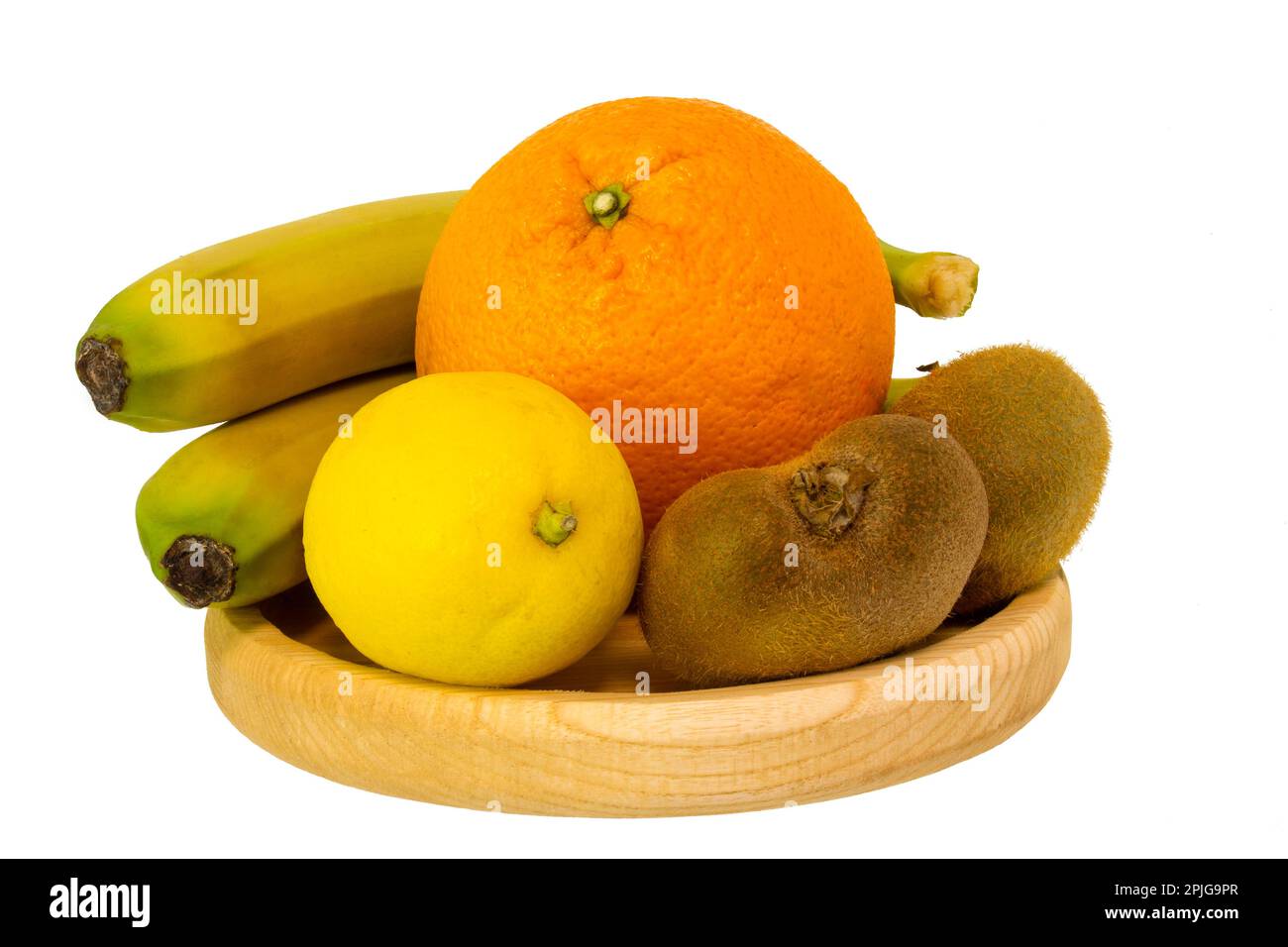 Fruits bananas, orange, lemon and kiwi lie on a wooden bowl isolated on ...