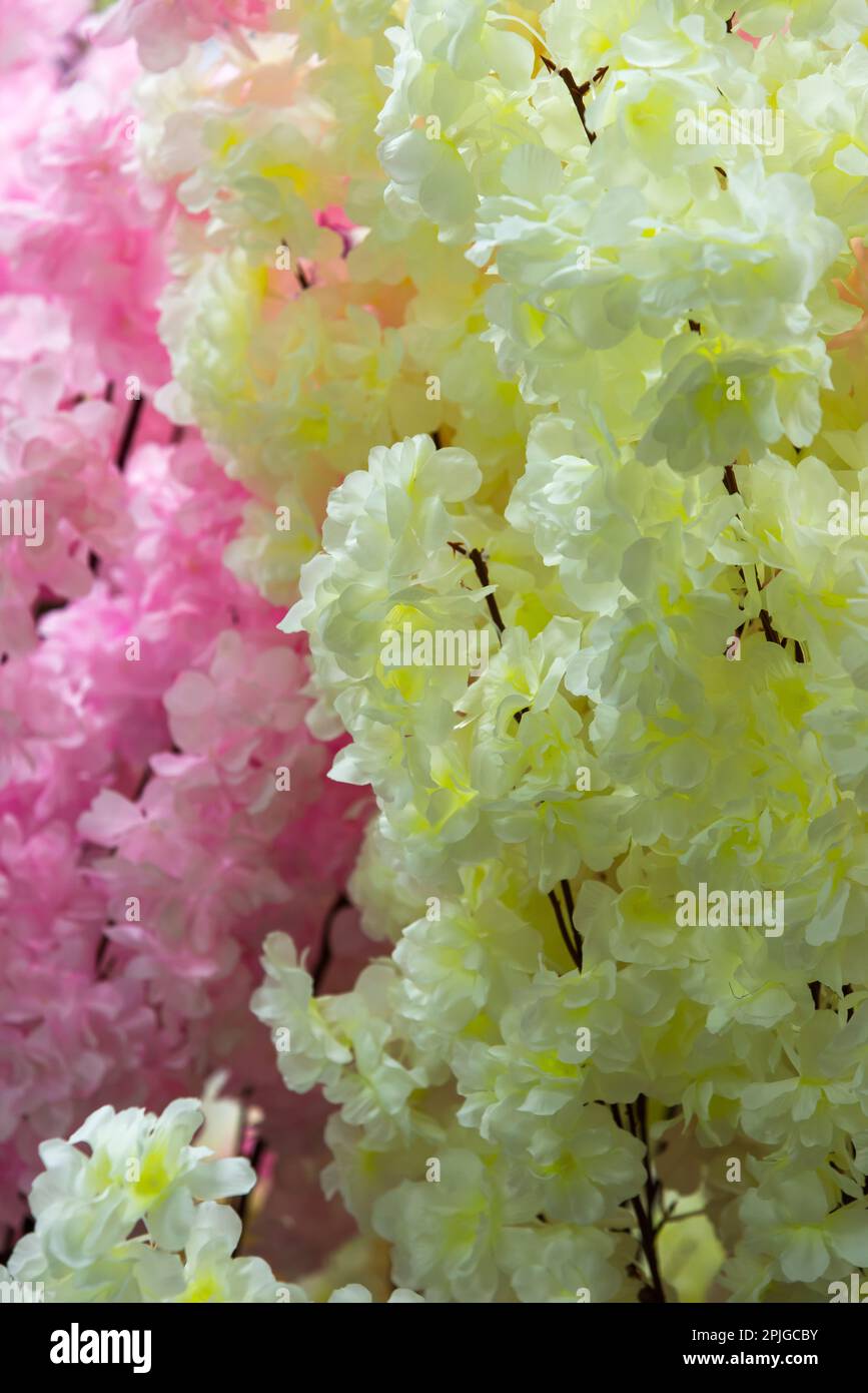 white yellow and pink artificial flowers to use for backgrounds and ...
