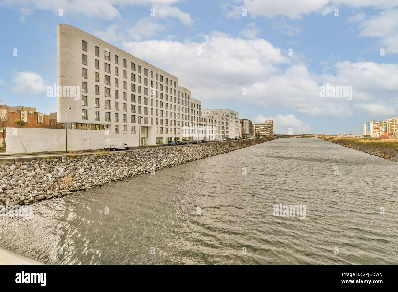 a river with buildings on both sides and water in the middle part of ...