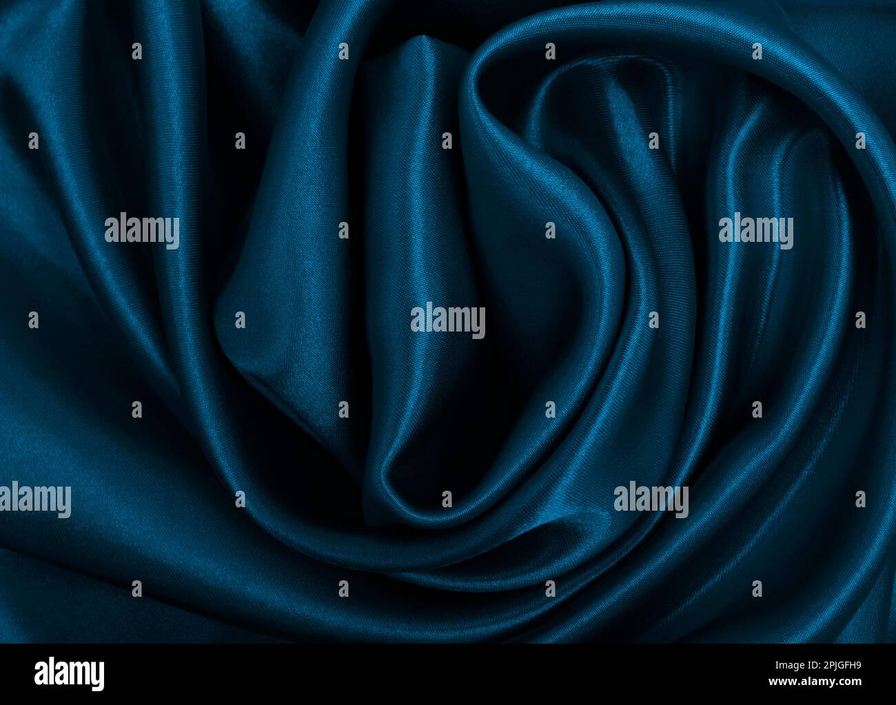 Smooth elegant blue silk or satin luxury cloth texture can use as abstract background. Luxurious ...