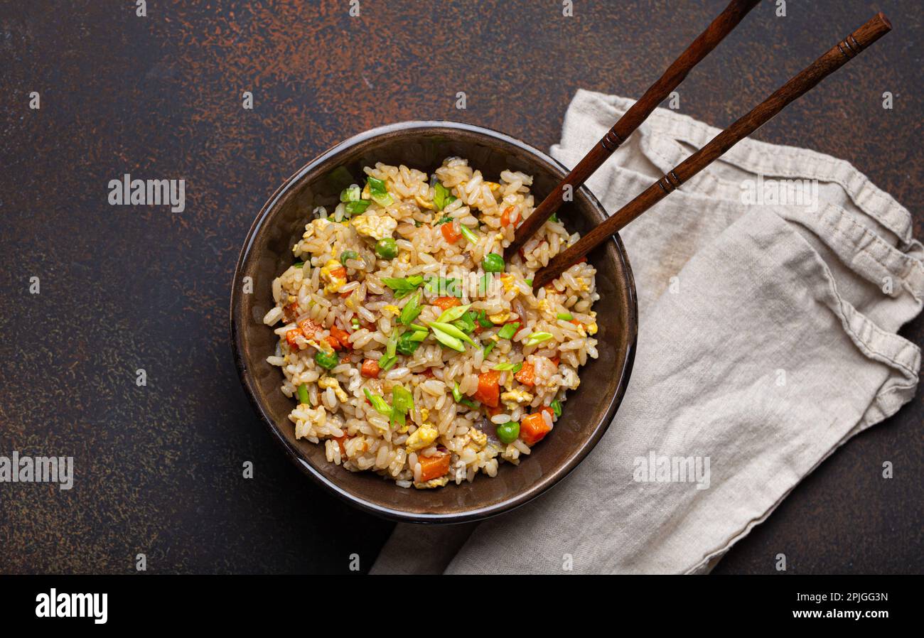 Authentic Chinese and Asian fried rice with egg and vegetables in ...
