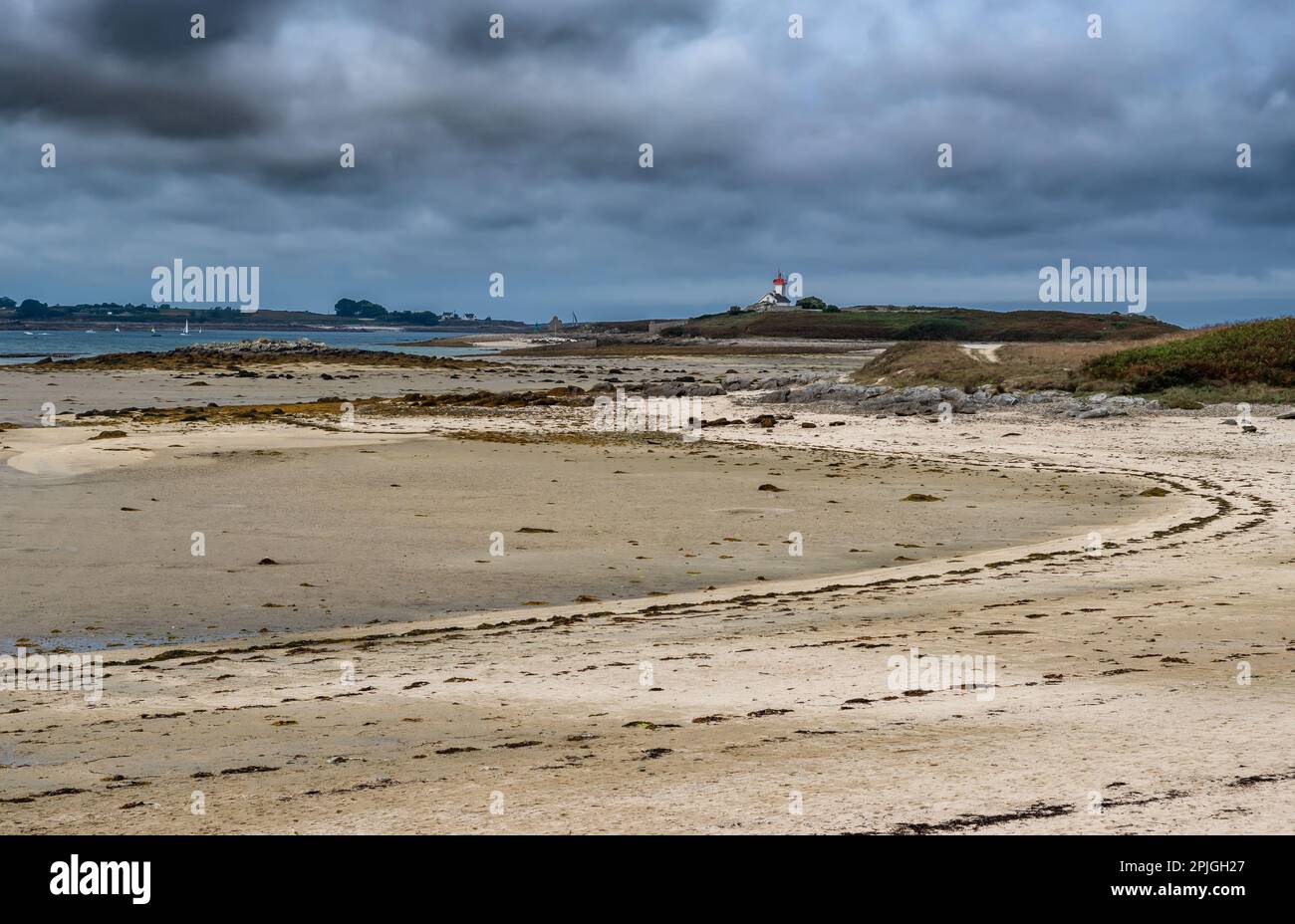 Beach Of Saint Cava With Lighthouse On Finistere Island Wrach In ...