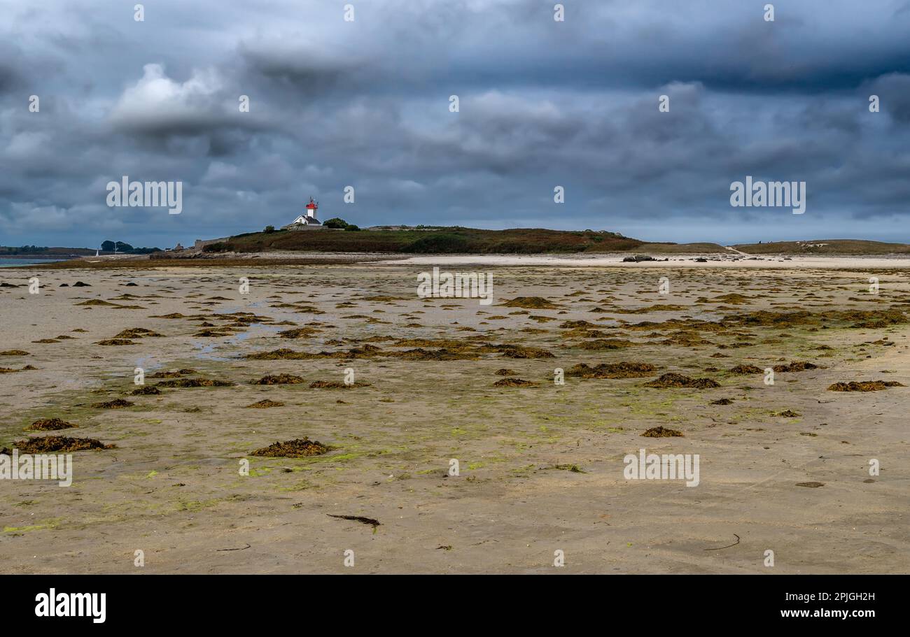 Beach Of Saint Cava With Lighthouse On Finistere Island Wrach In ...