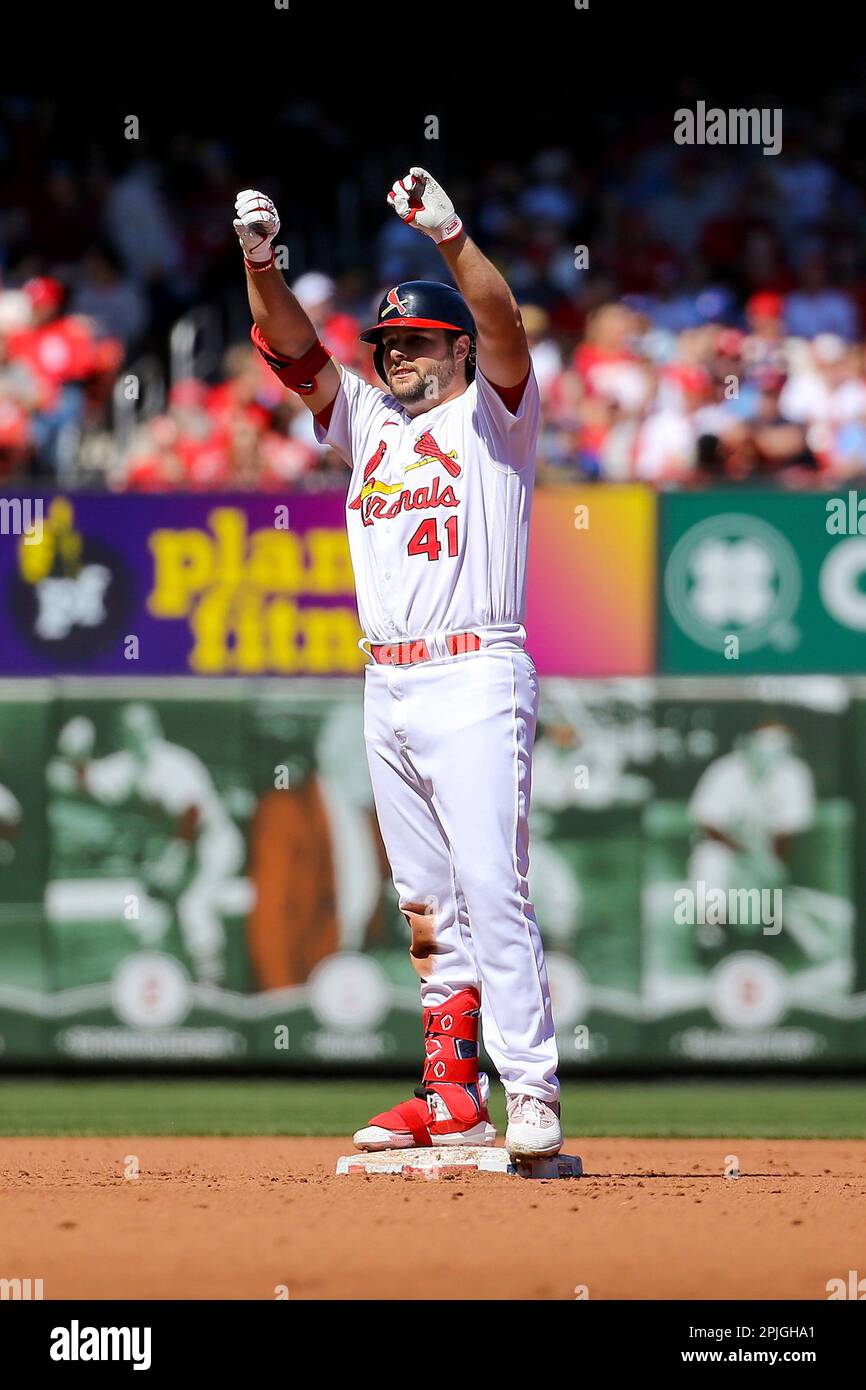 St. Louis Cardinals' Alec Burleson gestures toward the dugout after ...