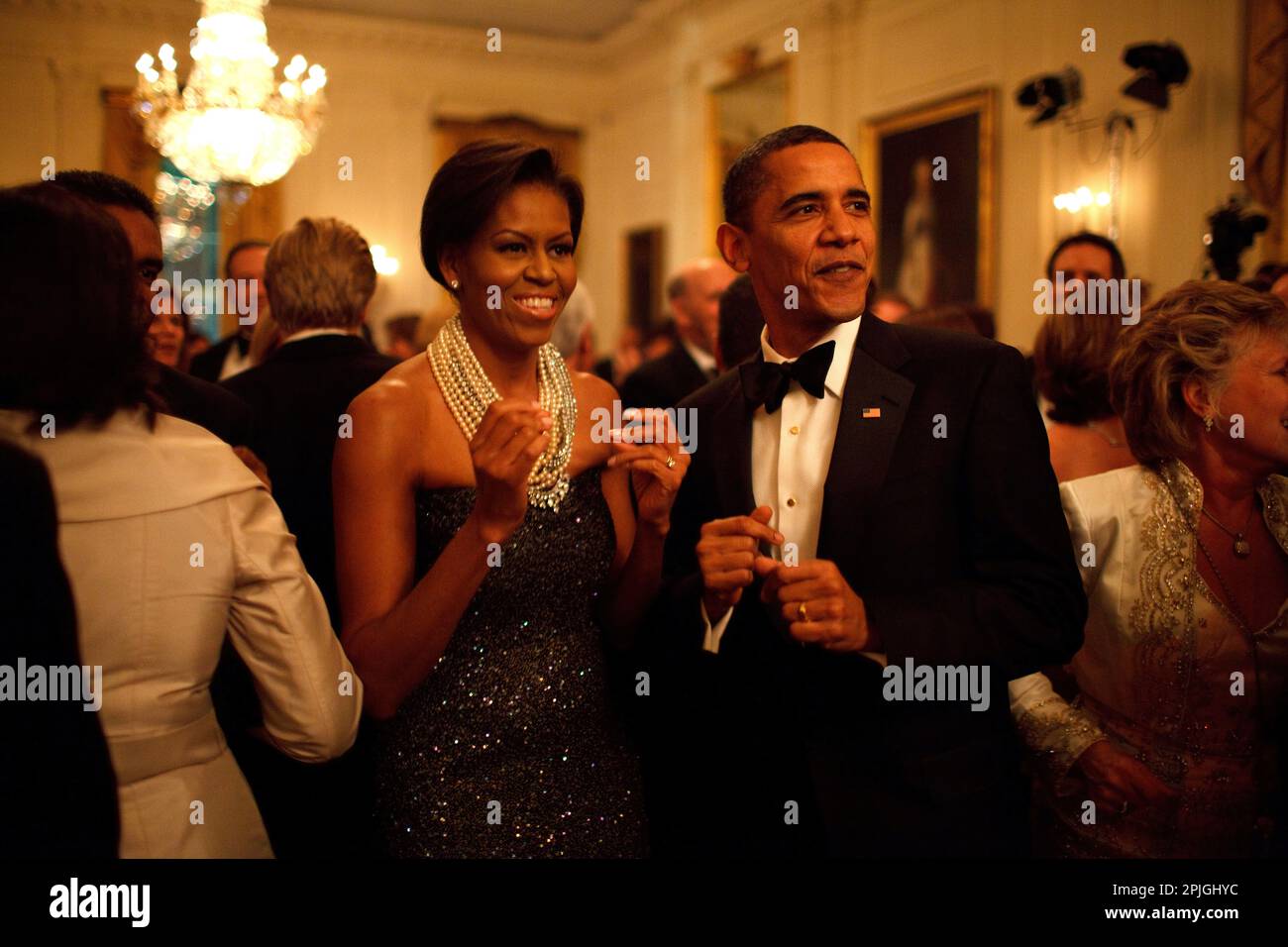 President Barack Obama and First Lady Michelle Obama dance while the ...