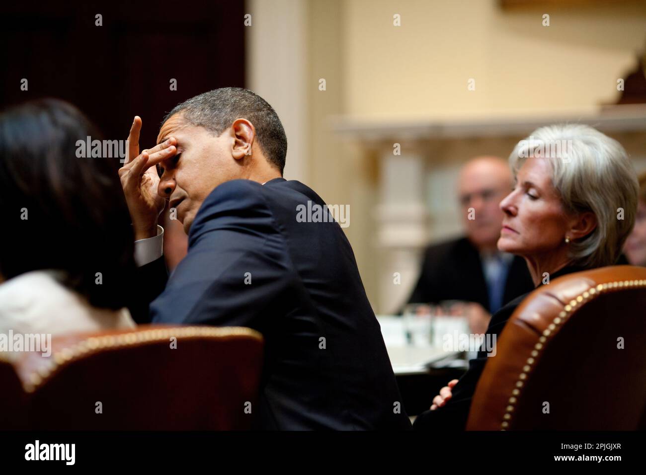 President Barack Obama listens to comments while meeting with ...