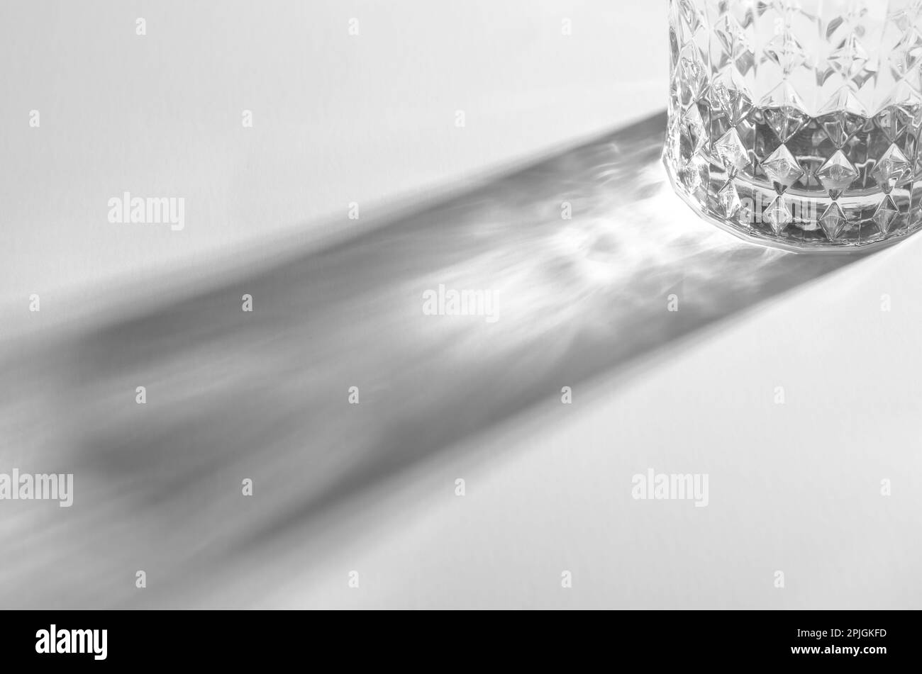 A Glass with Water and Sharp Shadows, Caustic Effect as Light Passes ...