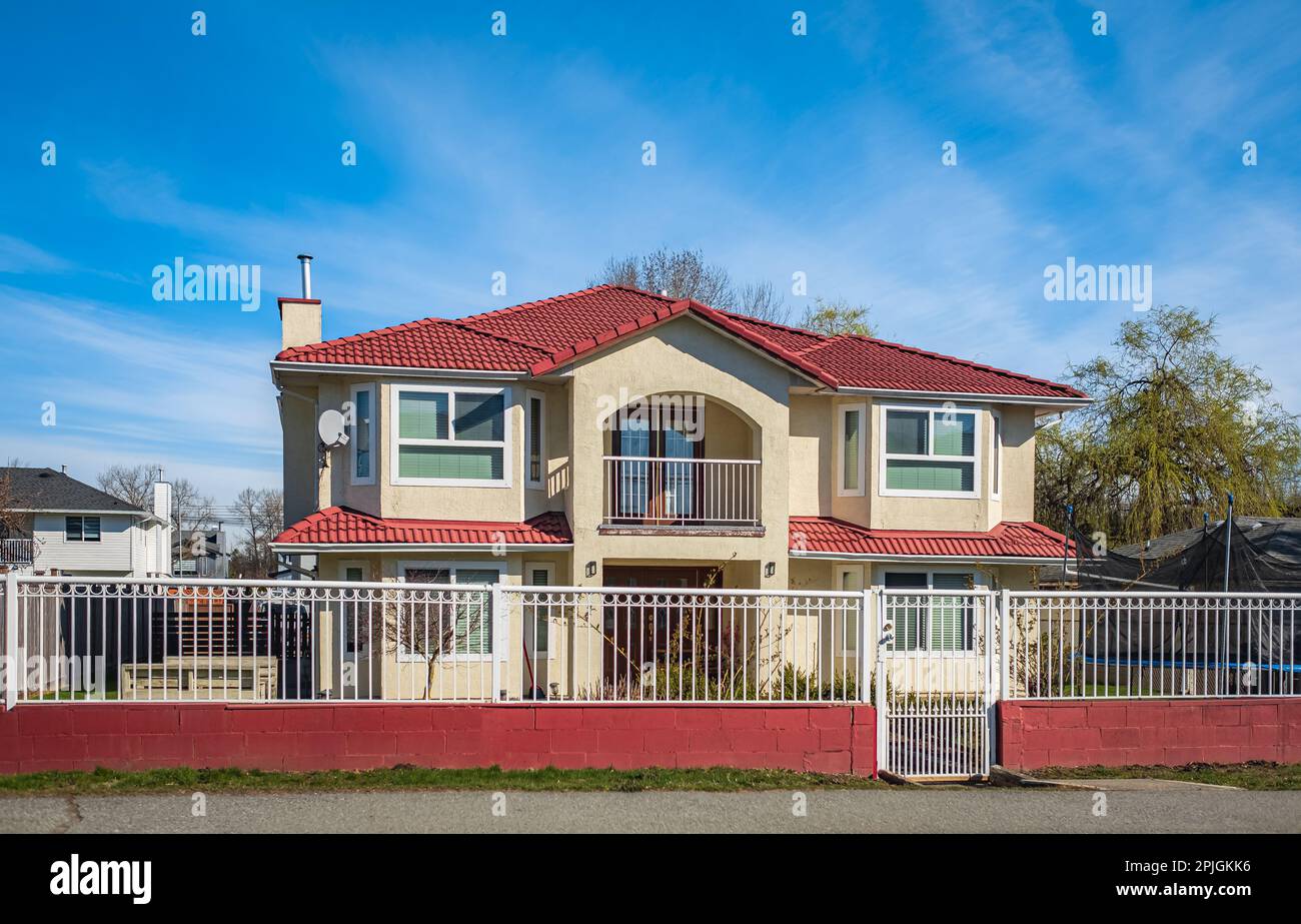 Real Estate Exterior Front House on a sunny day. Big custom made luxury ...