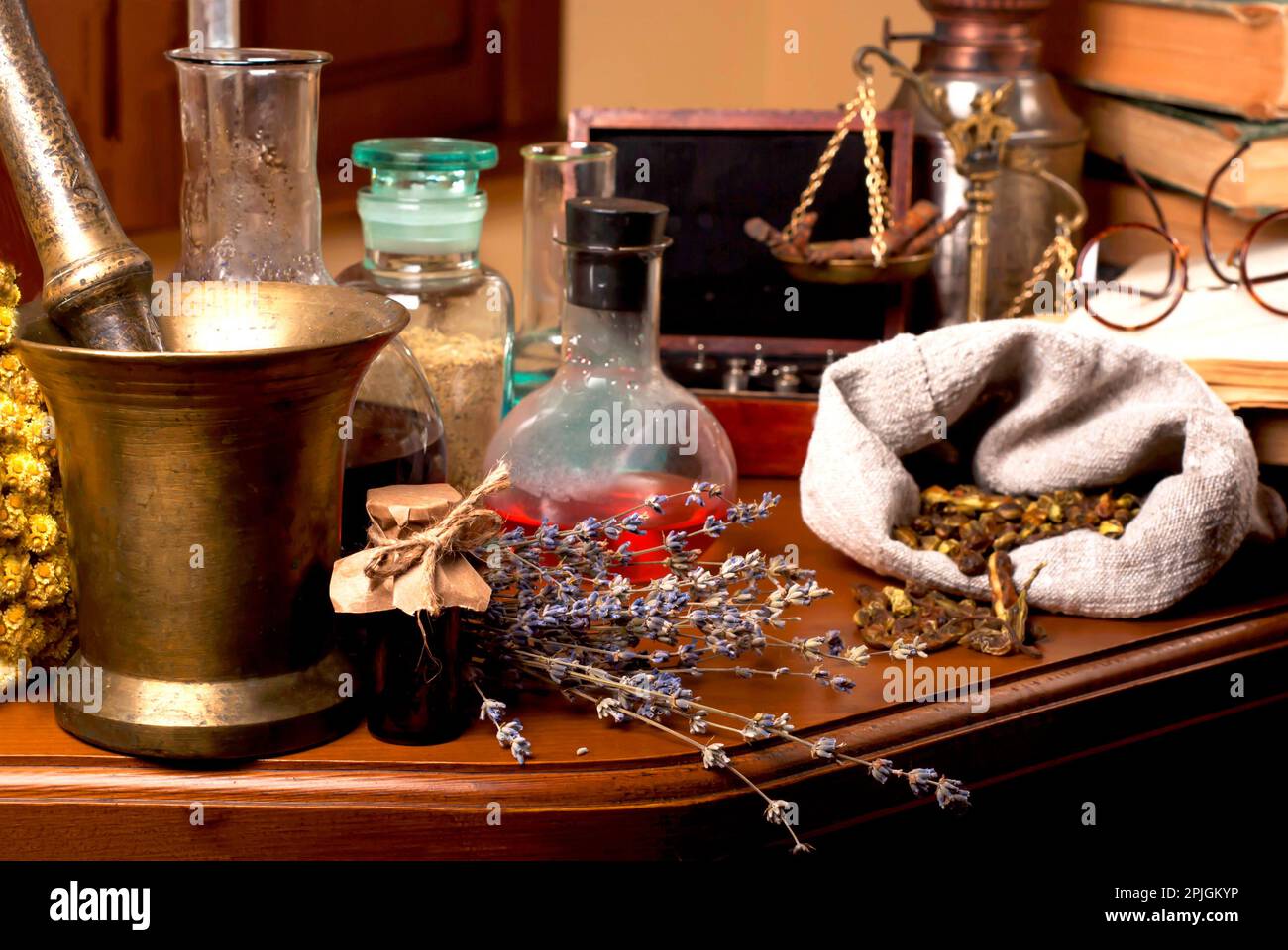 Dried healing herbs, flowers and candles, ritual purification ...